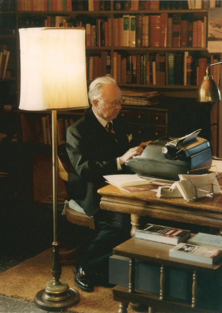 Working at his typewriter. | The Russell Kirk Center